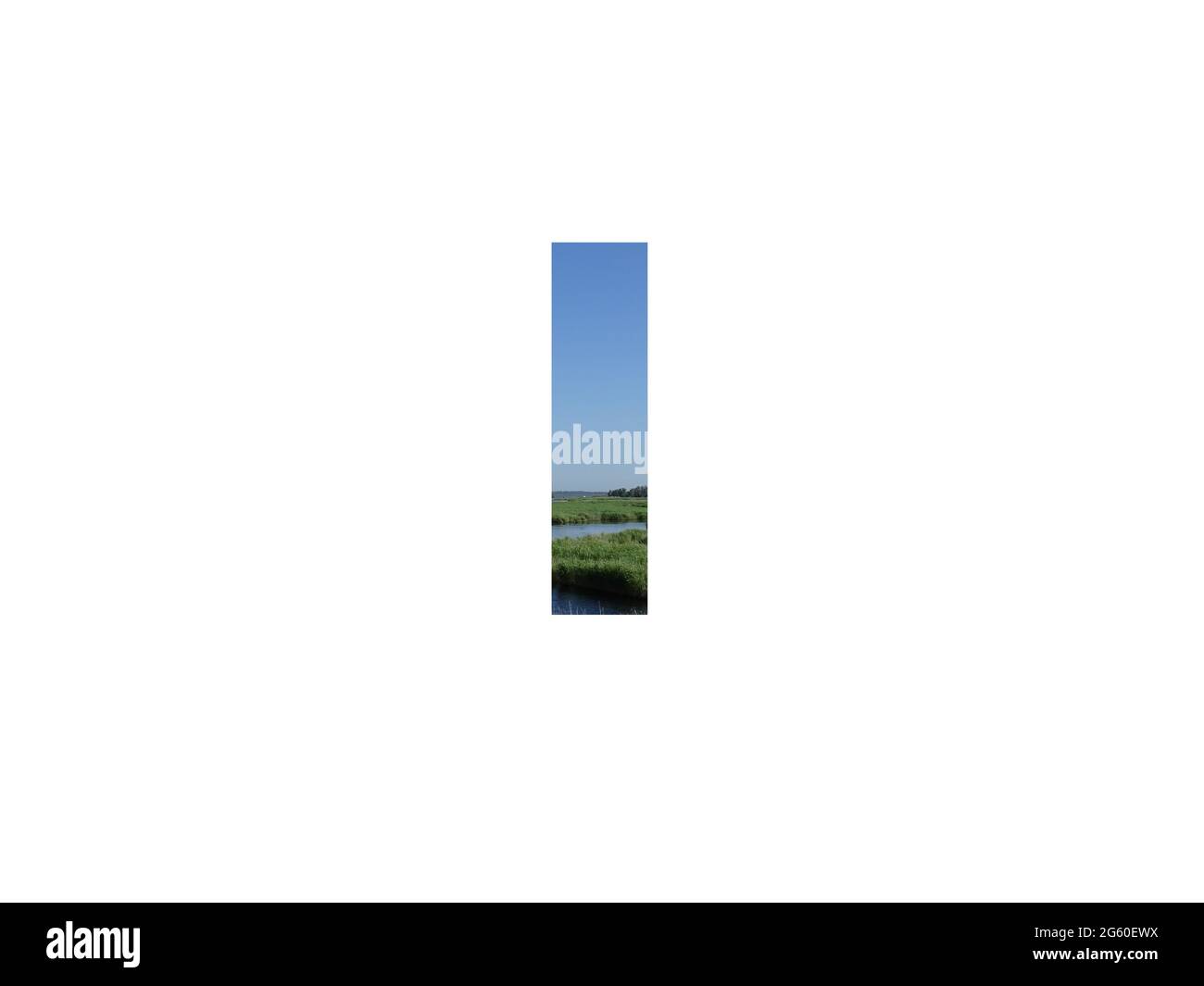 letter i of the alphabet made with landscape with grass, stream and a ...