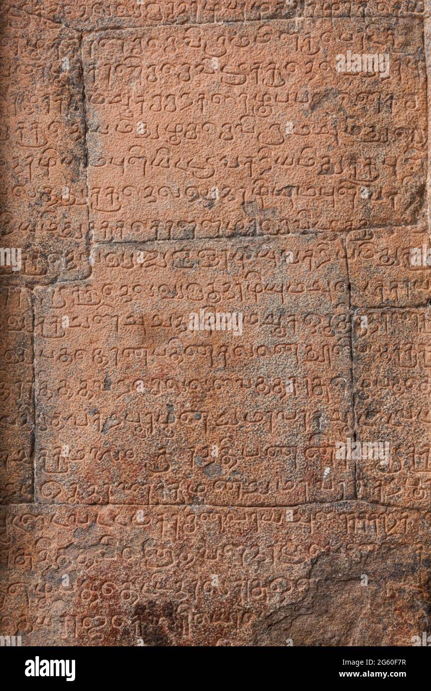 Ancient inscriptions stone wall in ancient Tamil language Stock Photo ...