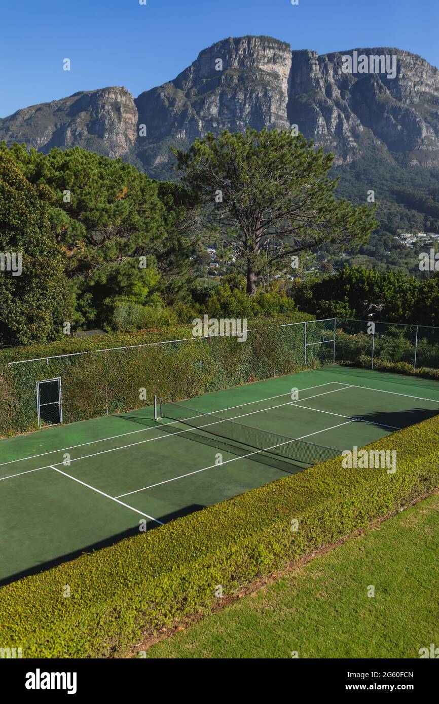 General view of tennis court in stunning countryside on sunny day Stock ...