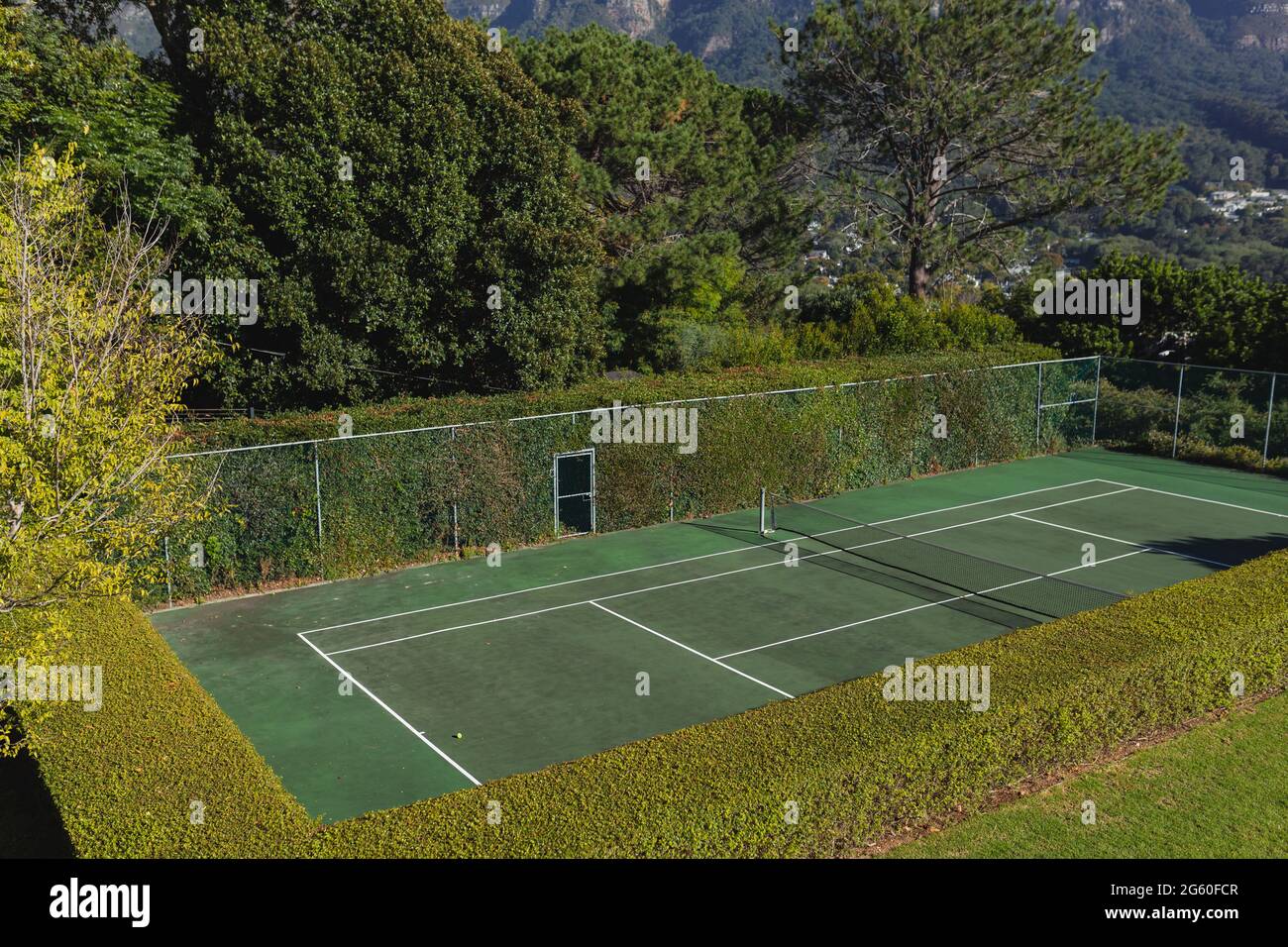 General view of tennis court in stunning countryside on sunny day Stock ...