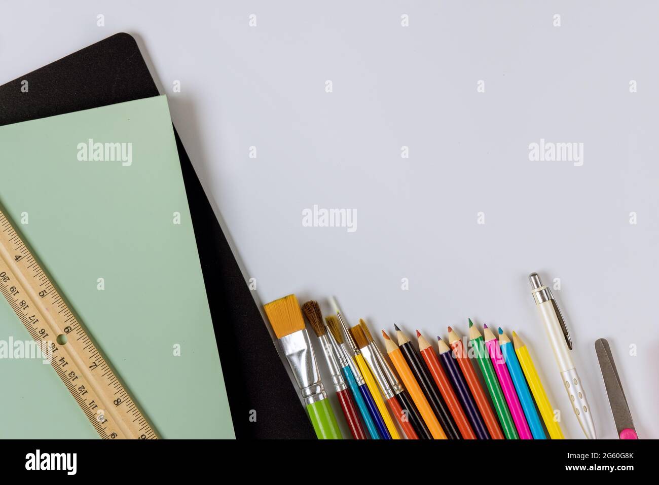 Table of flat lay on various school art supplies group student material ...