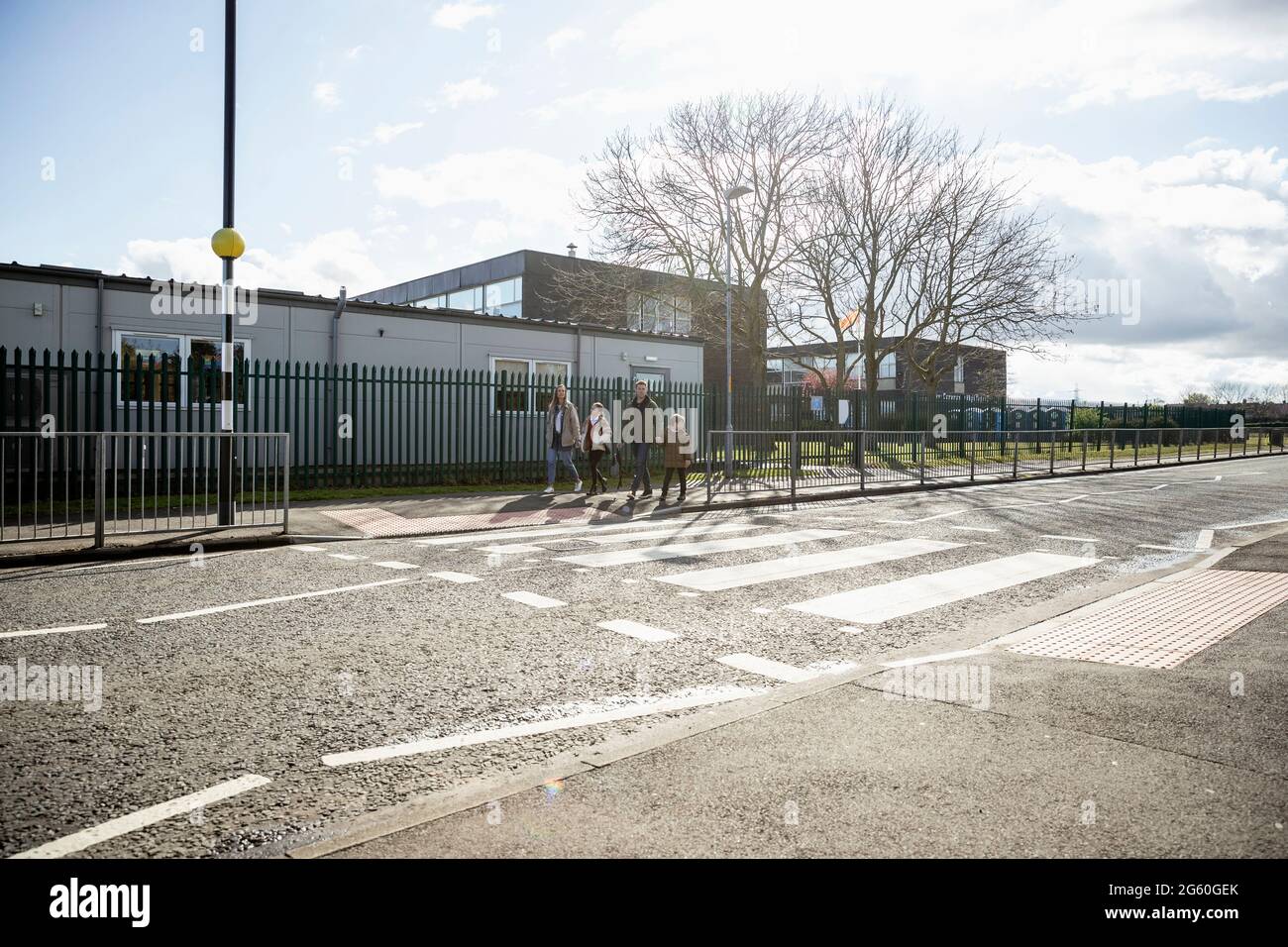 Children crossing zebra crossing hi-res stock photography and images ...