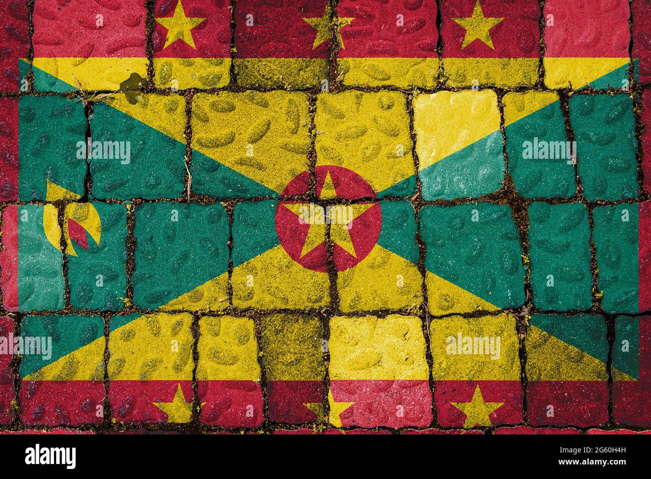 National flag of Grenada on stone wall background. Flag banner on stone ...