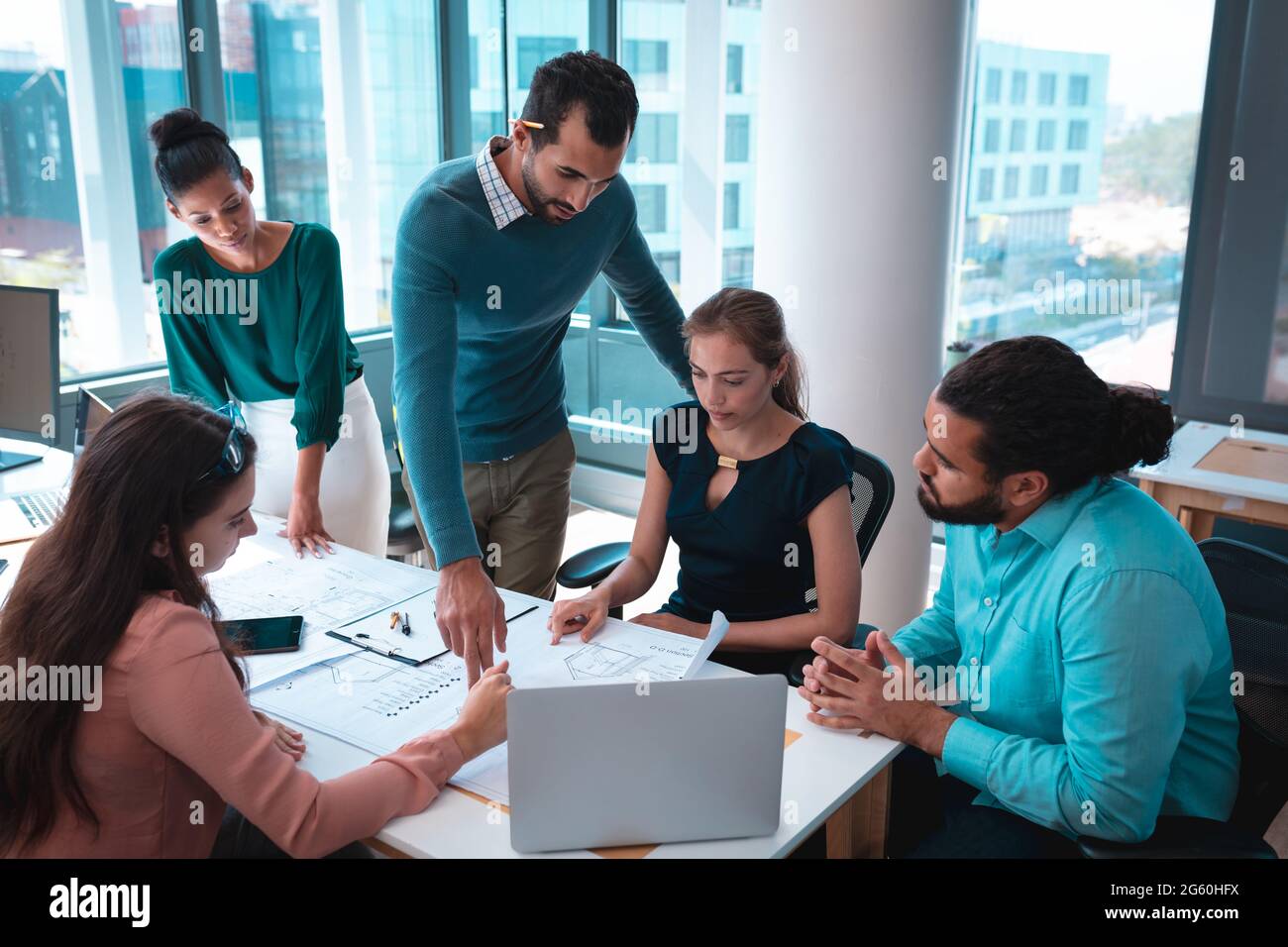 Group work colleagues sitting table hi-res stock photography and images ...