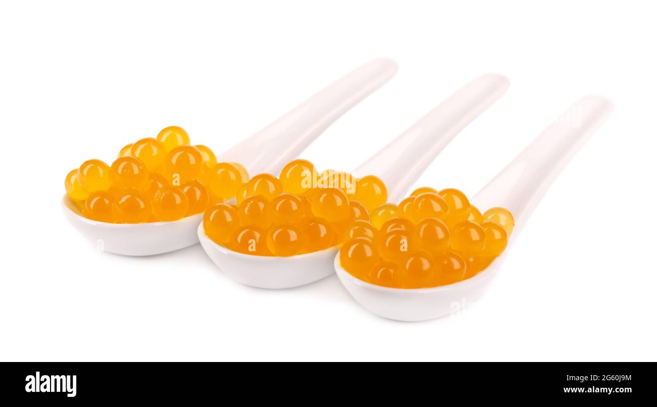 Yellow tapioca pearls for bubble tea isolated on white background ...