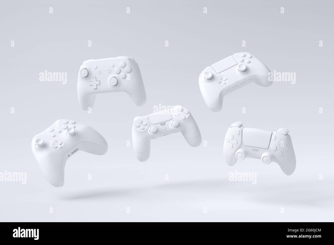 Flying gamer joysticks or gamepads on white background Stock Photo - Alamy