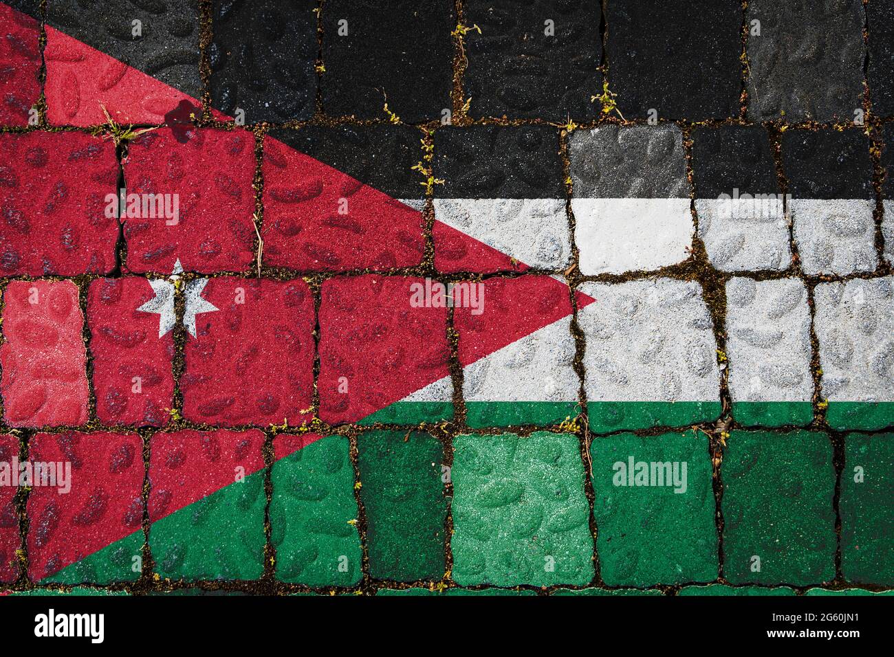 National flag of Jordan on stone wall background. Flag banner on stone ...