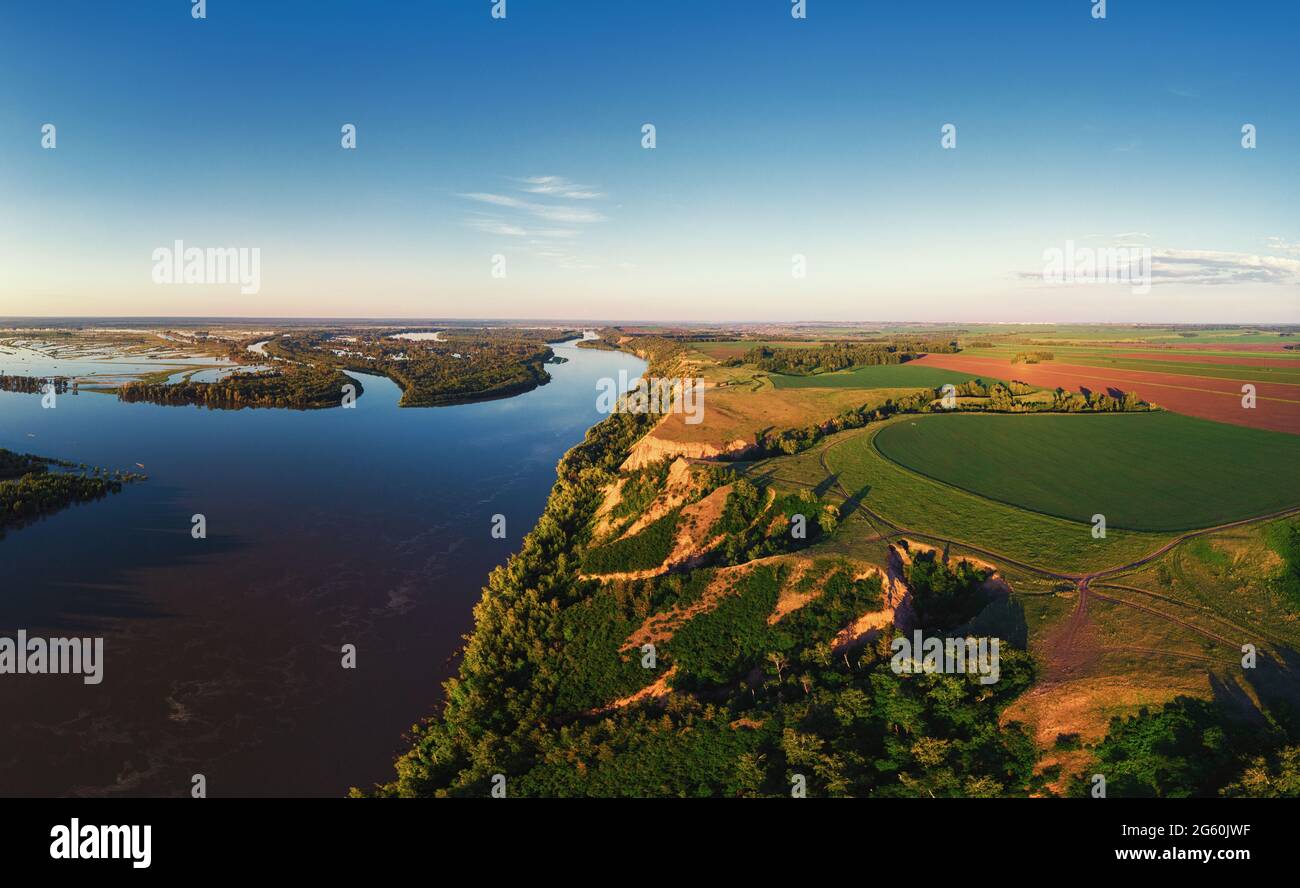 Aerial drone view of river landscape in sunny summer evening. Top view ...