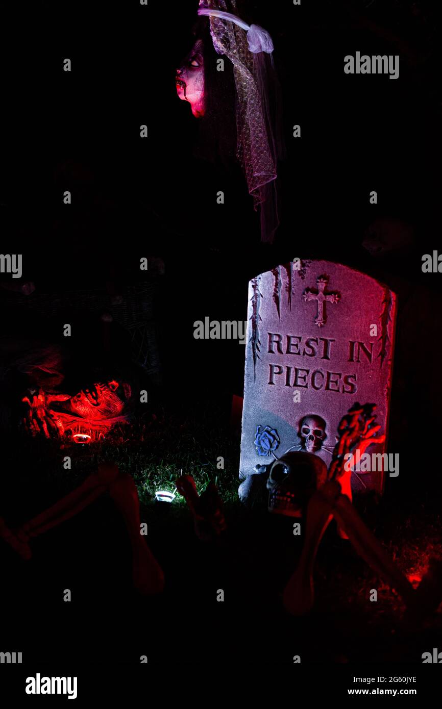 Halloween tomb in cemetery night with skeletons and zombie. Tombstone ...