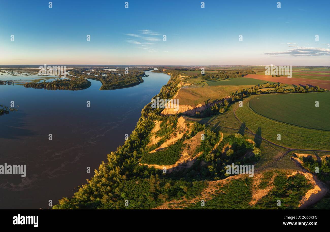Aerial drone view of river landscape in sunny summer evening. Top view ...