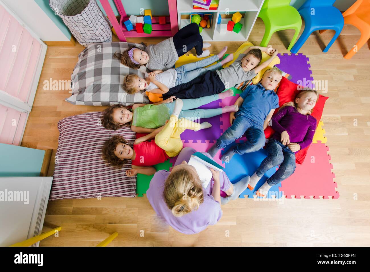 Boy laying on mat hi-res stock photography and images - Alamy