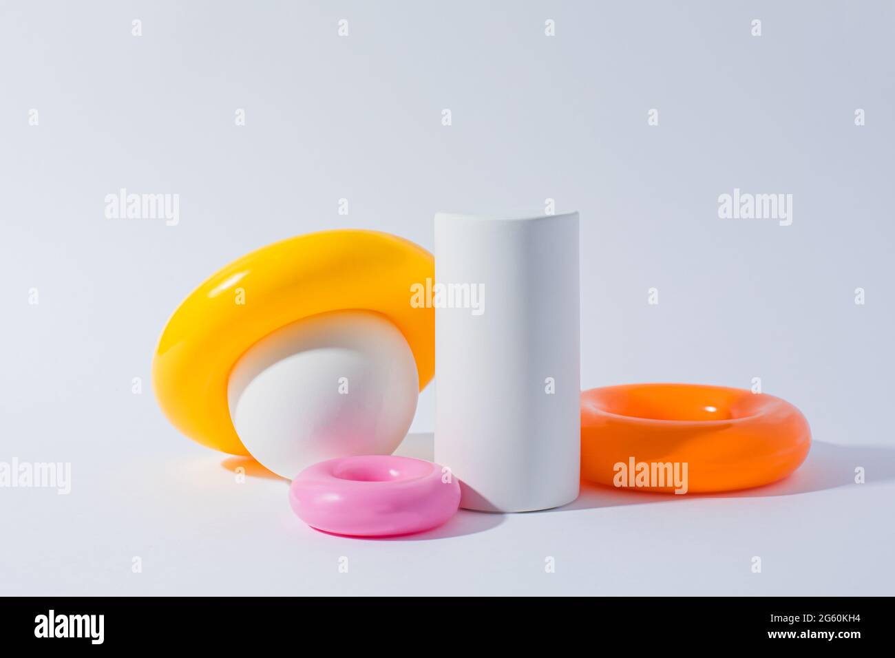 Variety of colorful geometric objects on white background Stock Photo ...