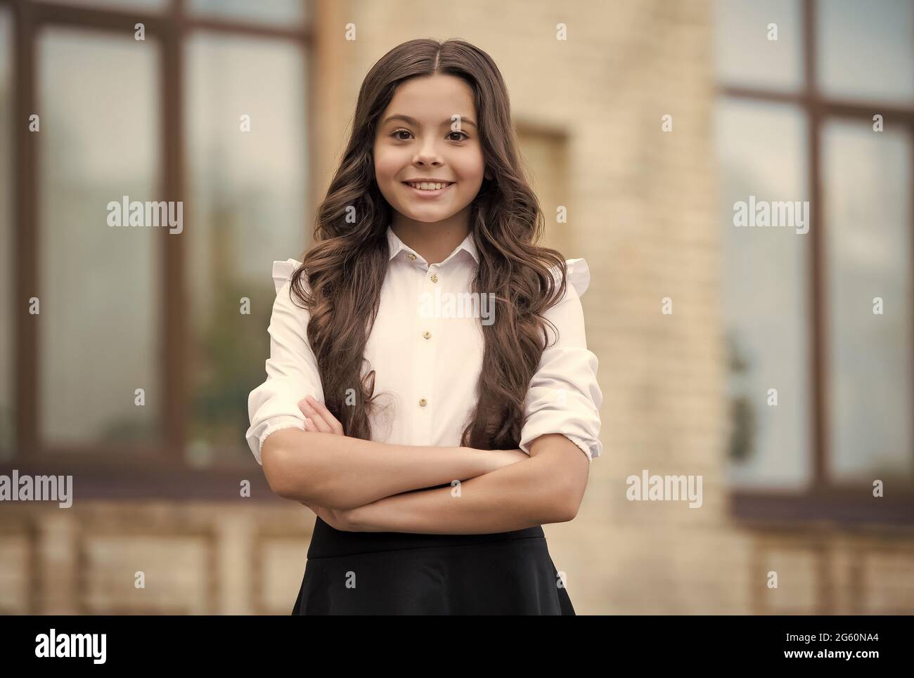 Dedicated to learning. Confident lyceum student keep arms crossed ...