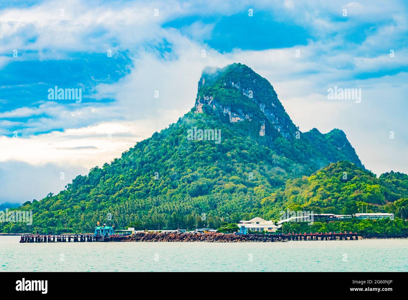 Travel to Don Sak over turquoise water in tropical landscape via ferry ...