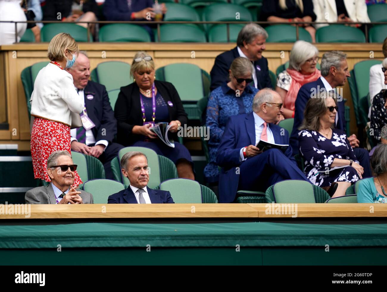 A general view of spectators in the Royal Box on centre court on day ...