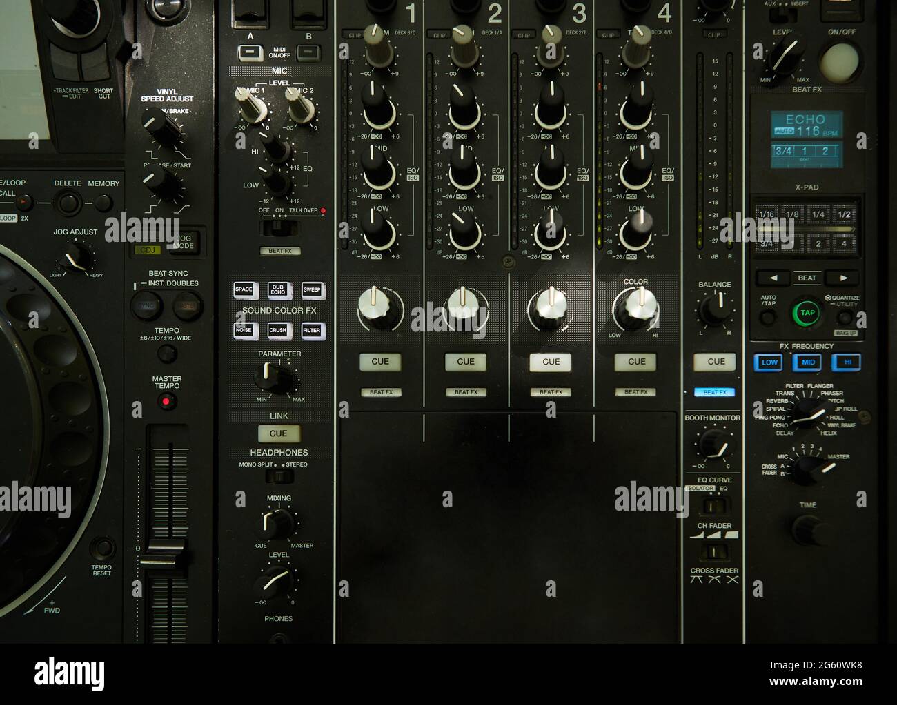 Upper view closeup of dj musical mixer professional console black color ...