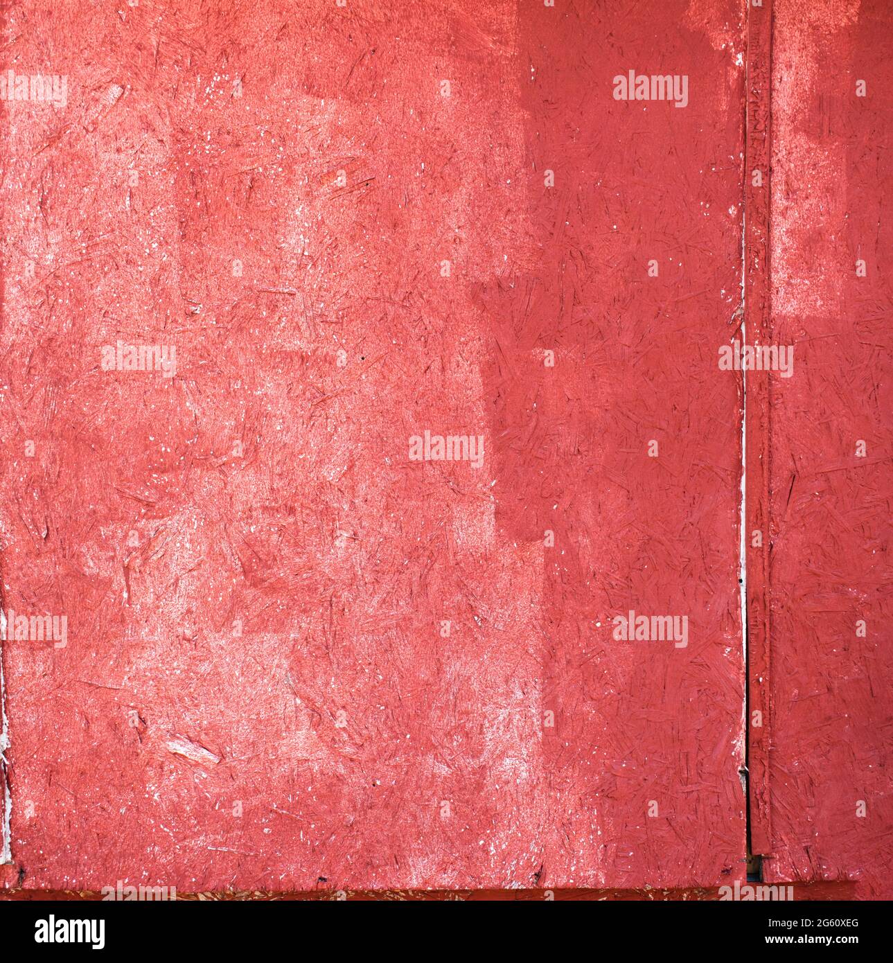 Close up on plywood with faded red paint Stock Photo - Alamy