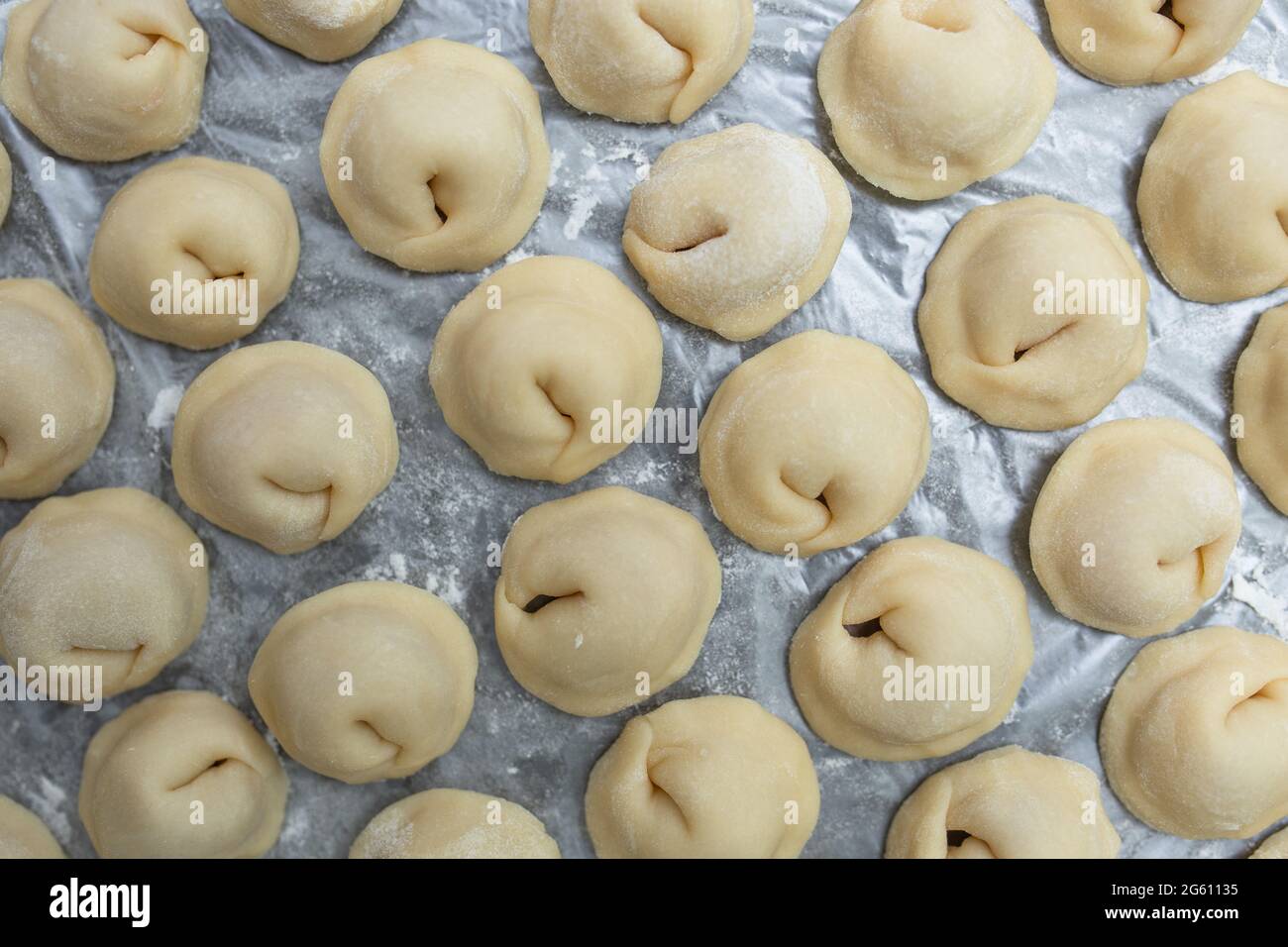 semi finished dumplings top view. homemade dumplings Stock Photo - Alamy
