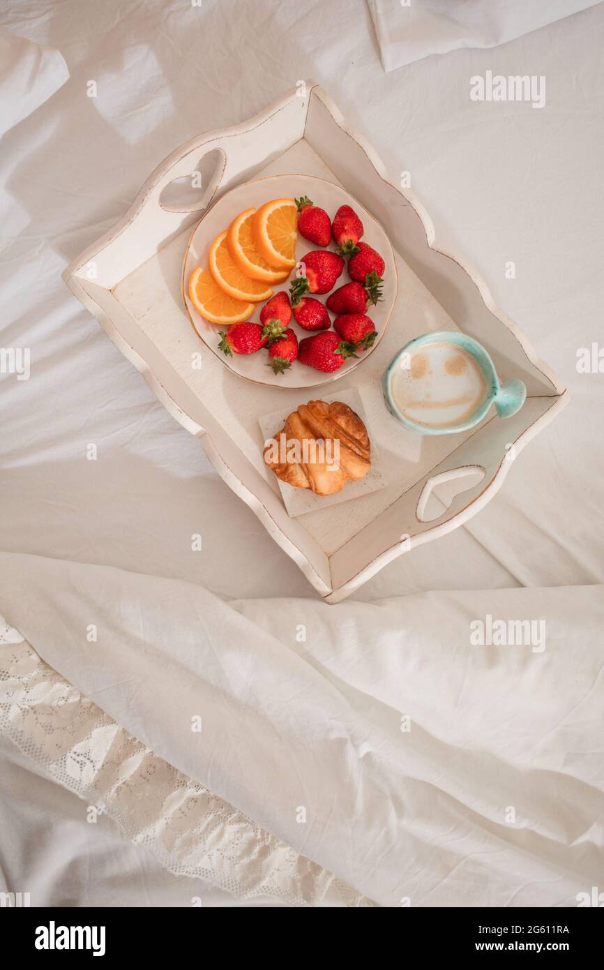 White tray with tasty breakfast to eat in bed Stock Photo - Alamy