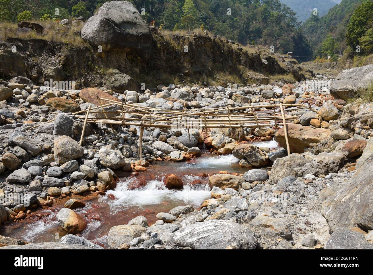 Villagers makeshift Bamboo bridge over high current himalyan river ,the ...
