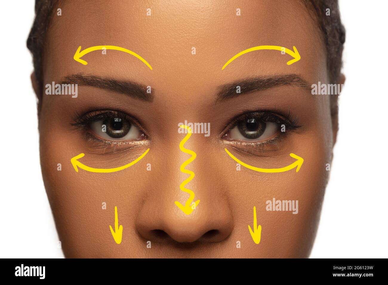 Close-up portrait of young, beautiful and healthy woman with arrows on ...