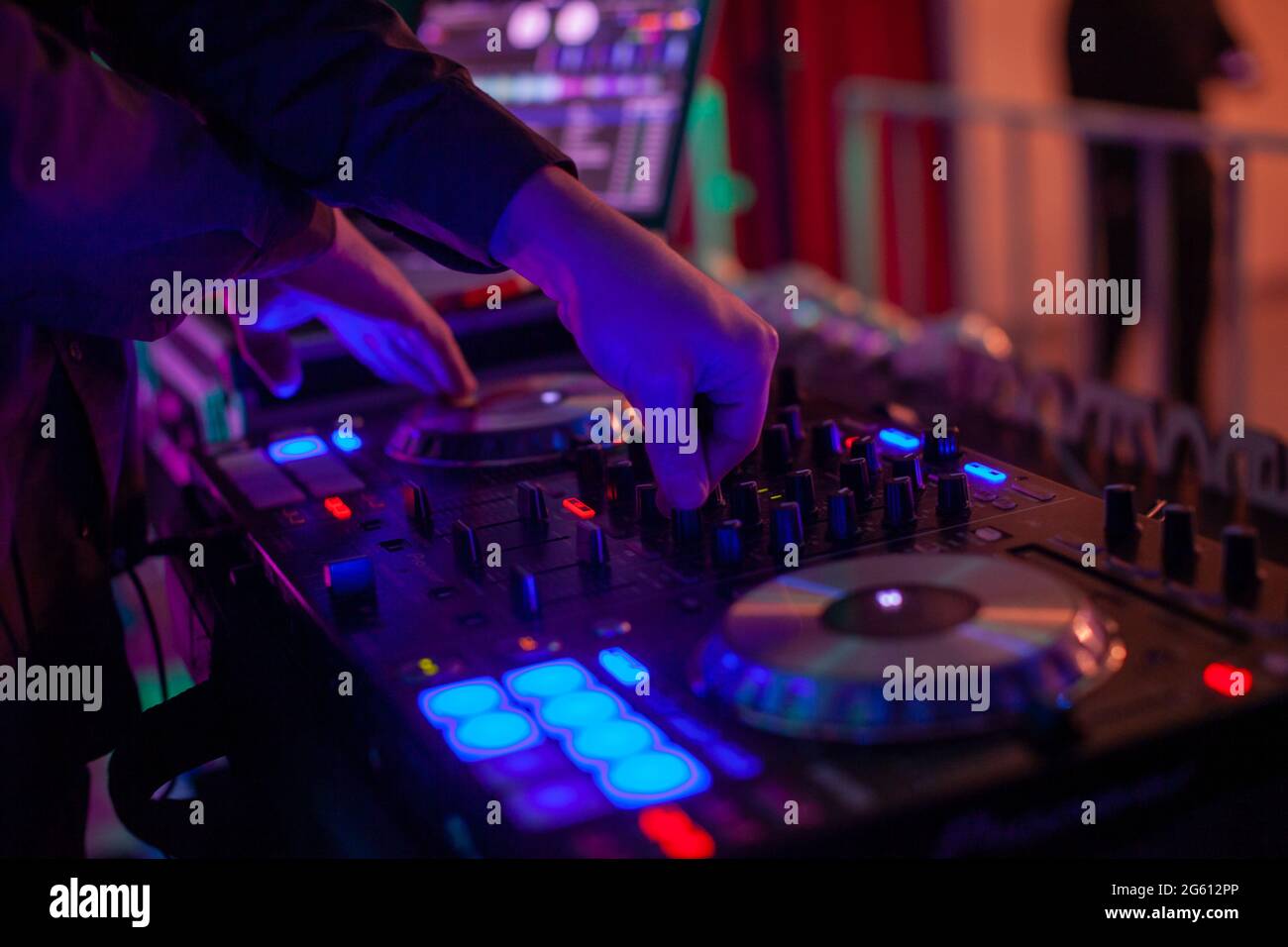 Dj mixing music in night club, close up Stock Photo - Alamy