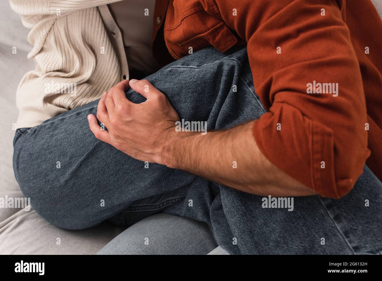 Man touching woman leg hi-res stock photography and images - Alamy