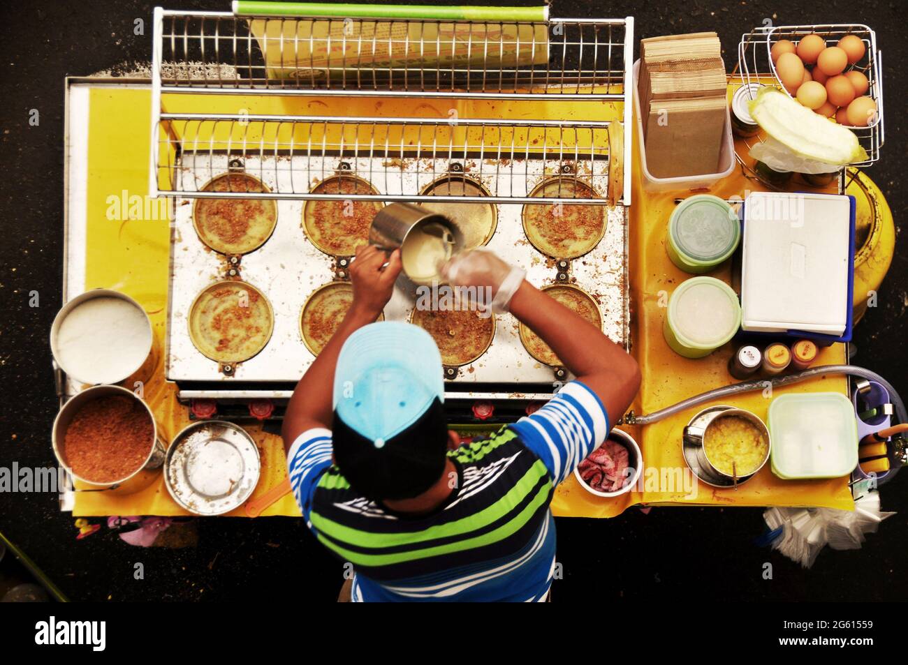 Filipino chef vendor cooking local street food philippine style at ...