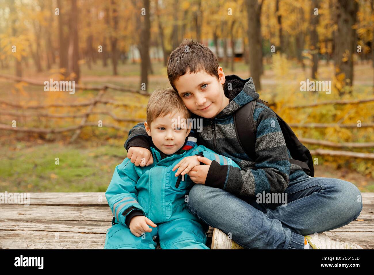 Beautiful brothers who are smiling happily together. Two happy boys ...
