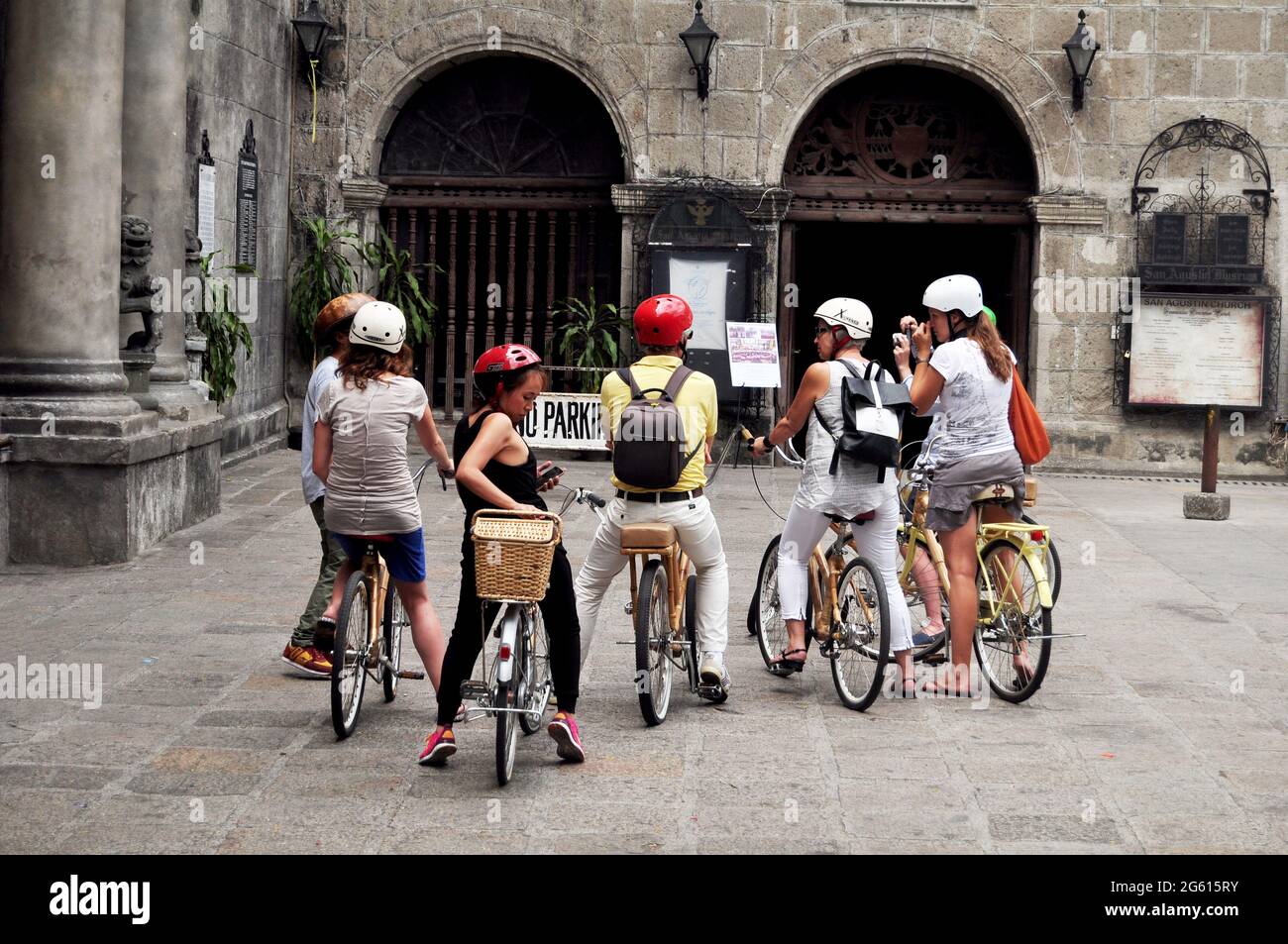 Filipino people guide and foreign travelers travel visit San Agustin ...