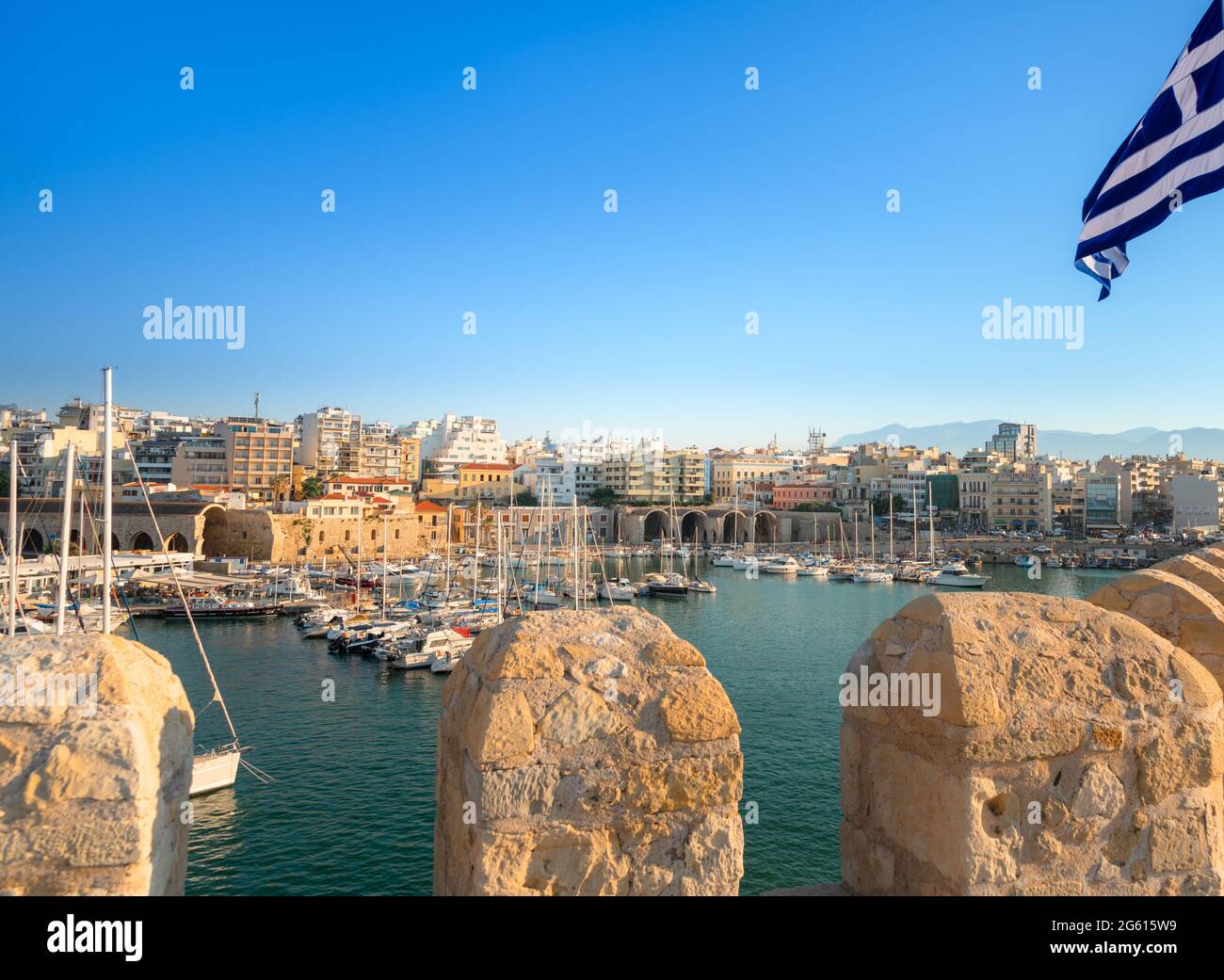 Heraklion harbour with old venetianfort Koule and shipyards, Crete ...