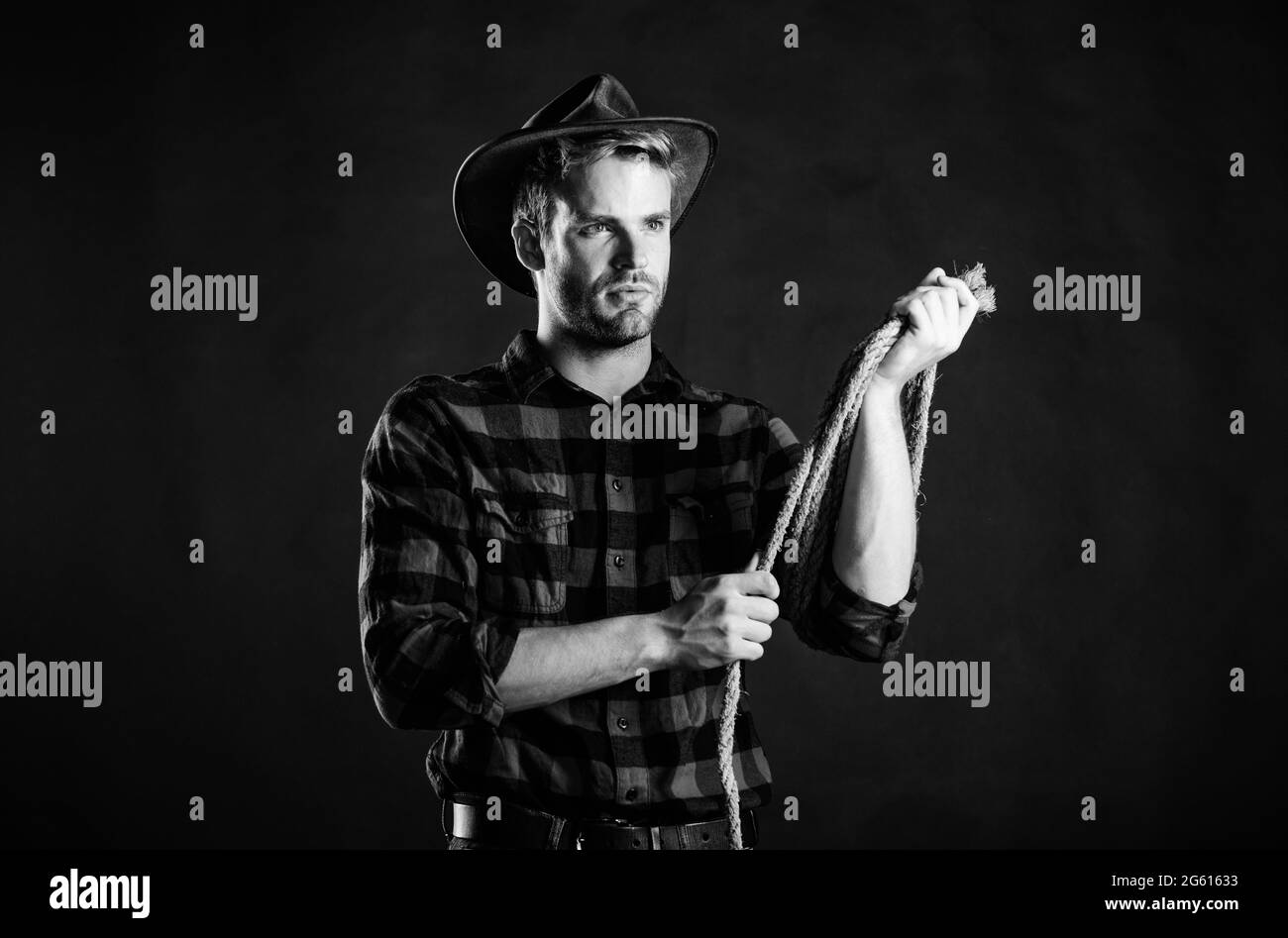 Brutal and confident. Western life. Man unshaven cowboy black ...