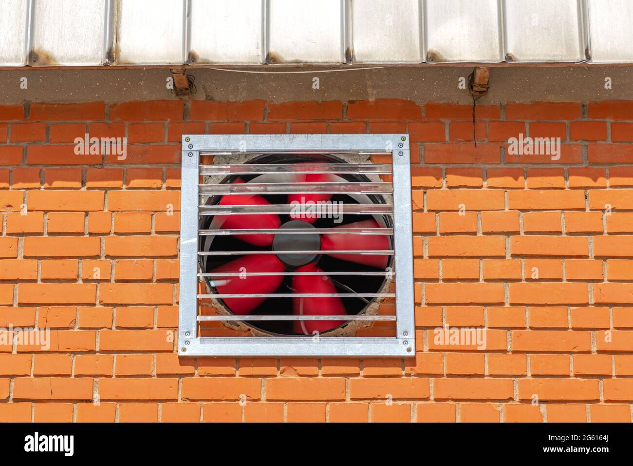 Air Extraction Fan Louvre at Brick Building Exterior Stock Photo - Alamy