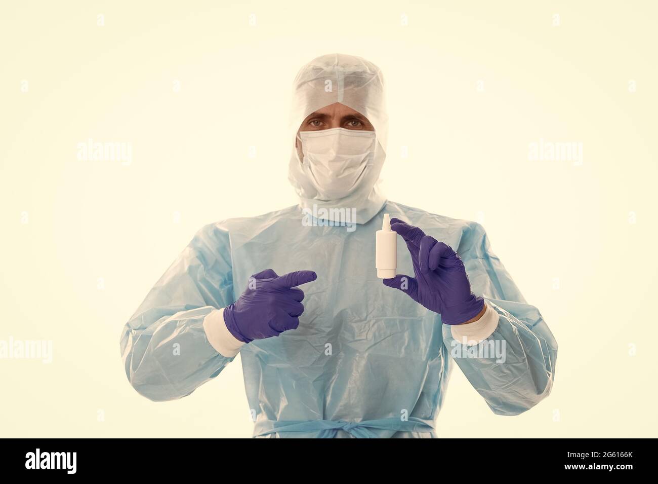 Safe and effective. Health professional point finger at drug bottle ...