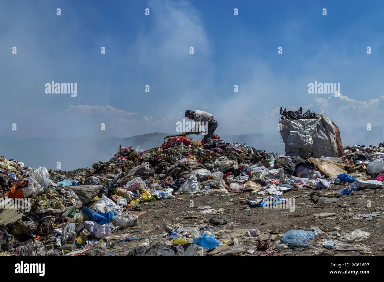 View of an open landfill, food and plastic waste products polluting in ...