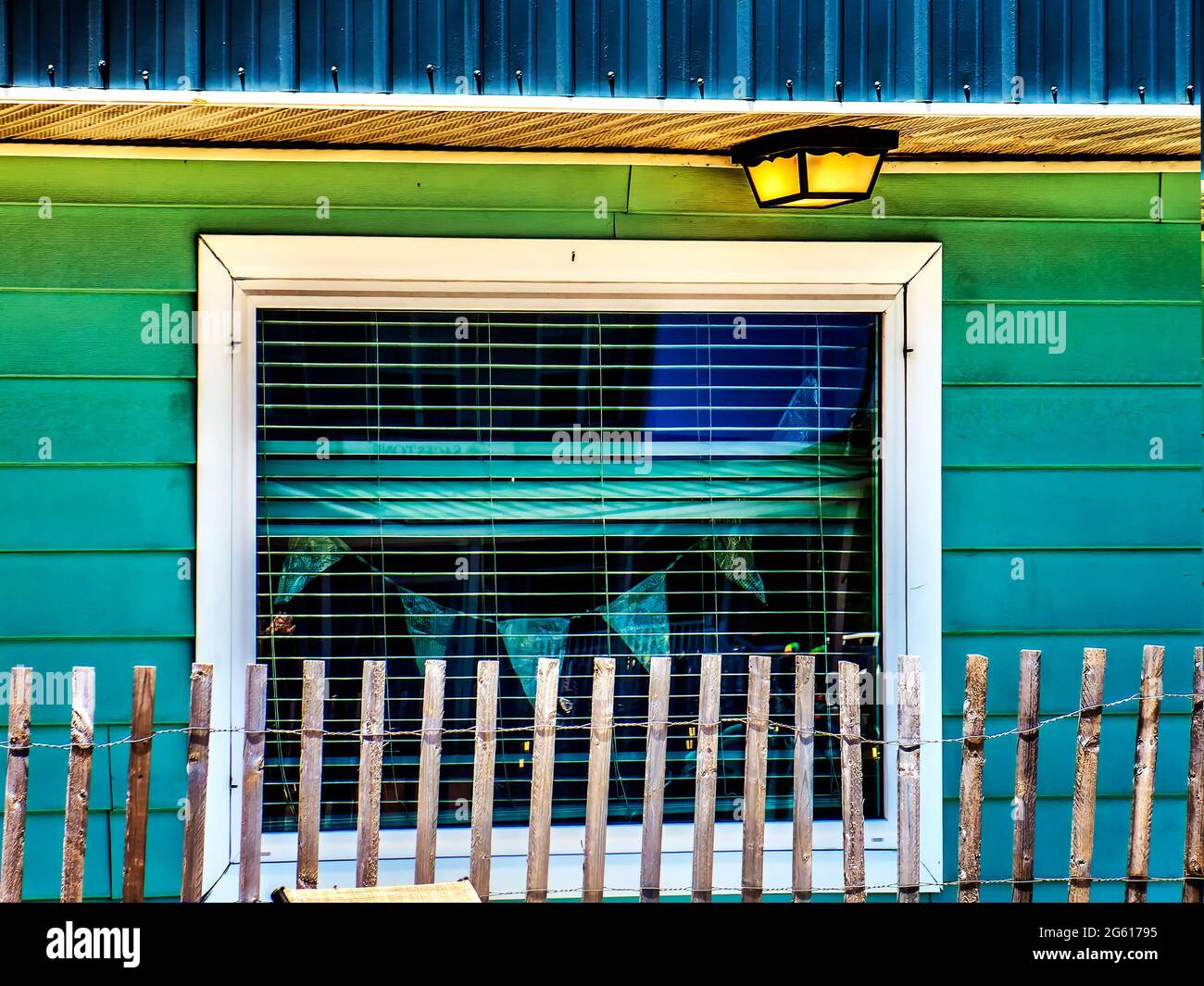 Light over the window of a restaurant in a beach resort Stock Photo - Alamy
