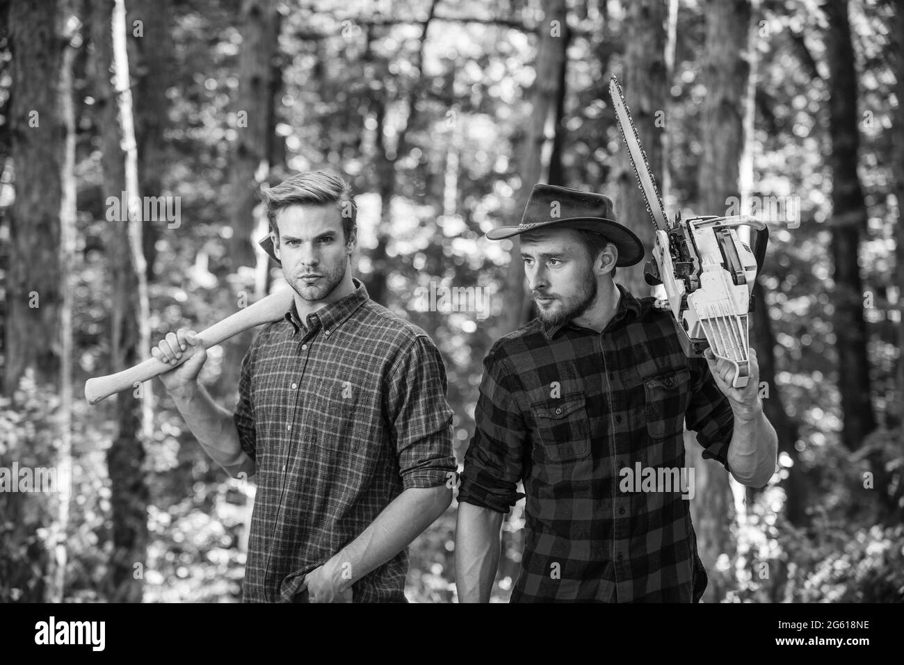 Surviving in wild nature. human and nature. men hiking in wood ...