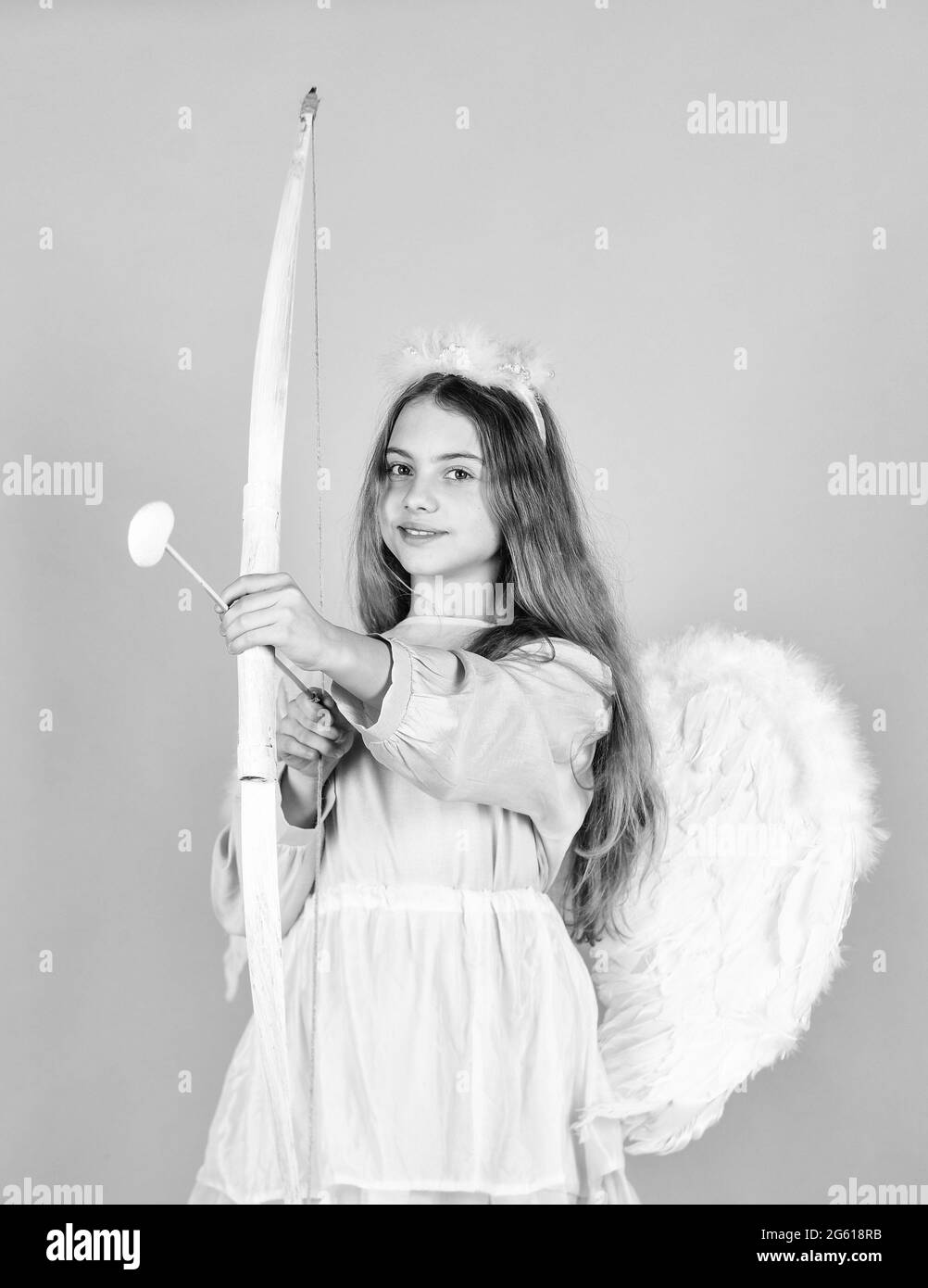 Girl in angel costume Black and White Stock Photos & Images - Alamy