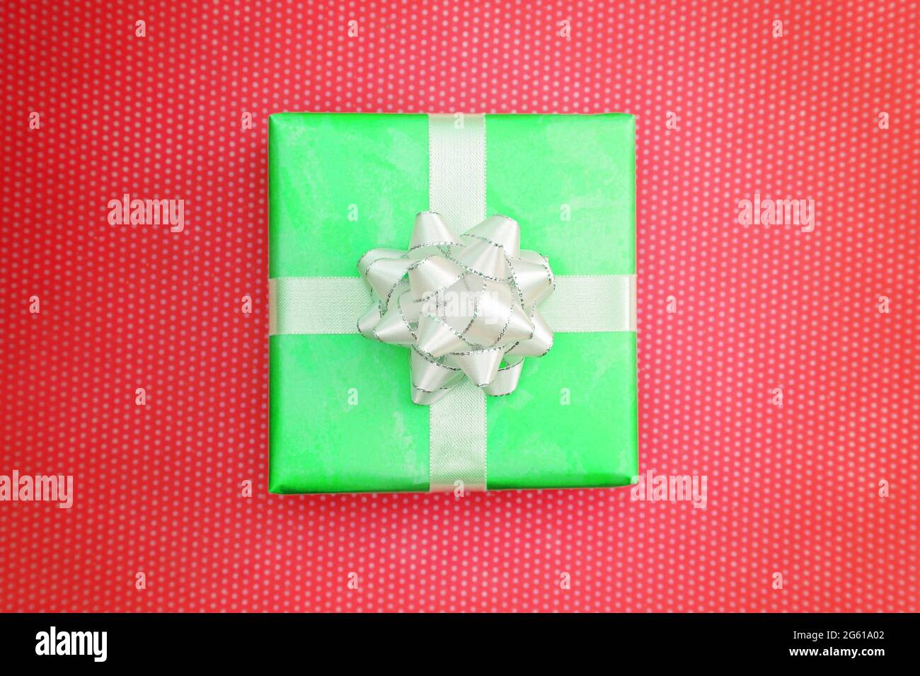 A Single Simple Wrapped Present on a Matching Background Stock Photo ...