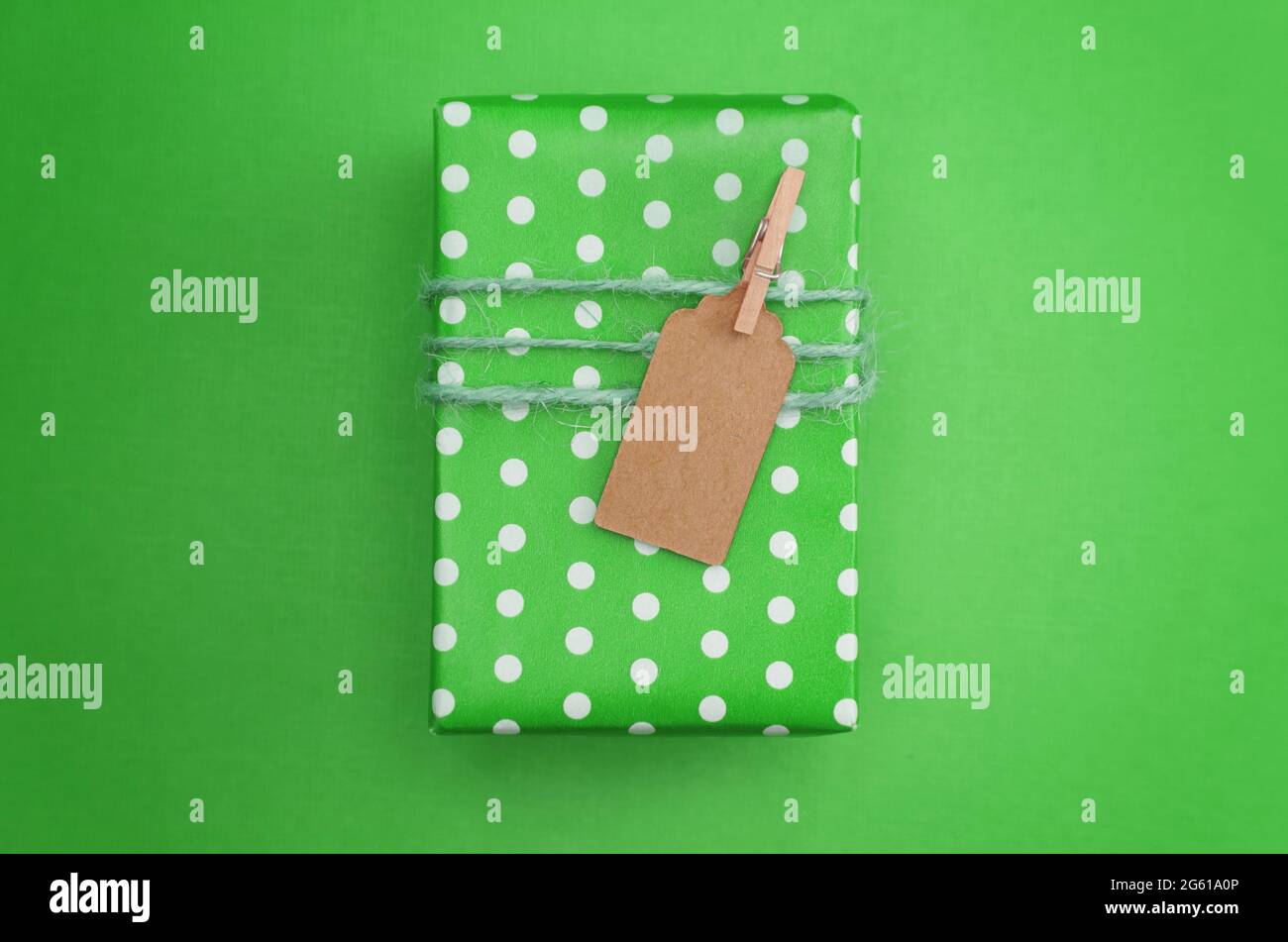 A Single Simple Wrapped Present on a Matching Background Stock Photo ...