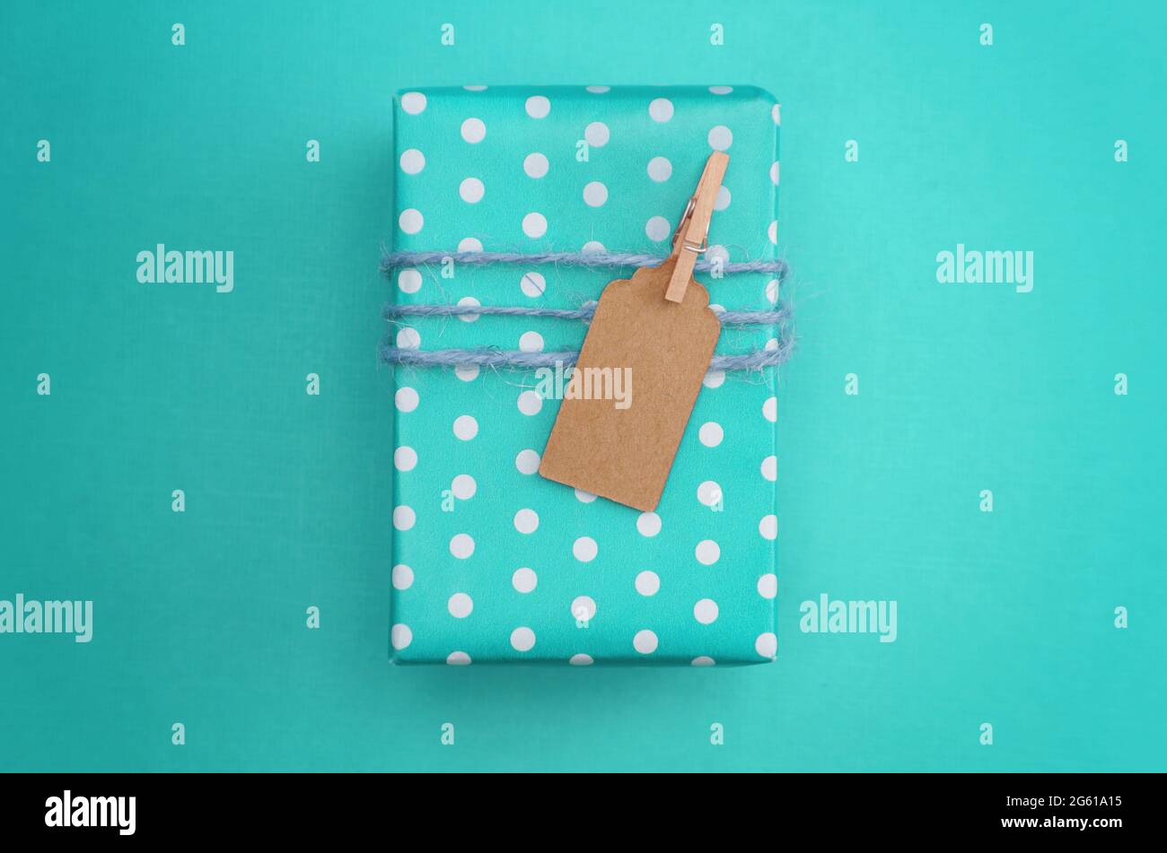 A Single Simple Wrapped Present on a Matching Background Stock Photo ...