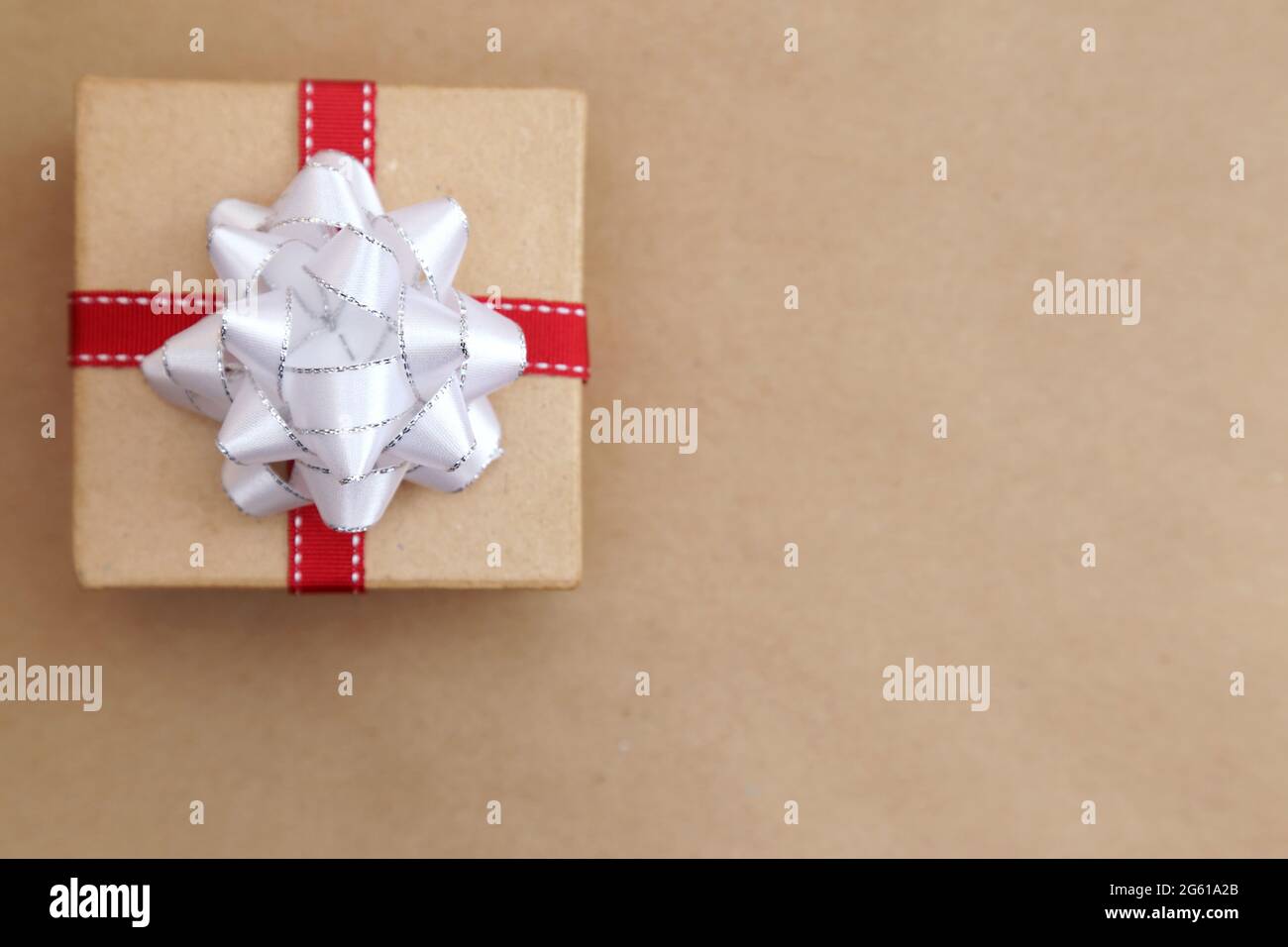 A Single Simple Wrapped Present on a Matching Background Stock Photo ...