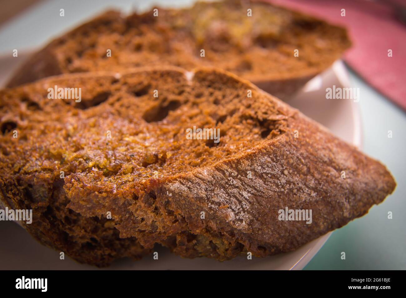 Toasted rye bread in a plate close-up. Morning breakfast Stock Photo ...