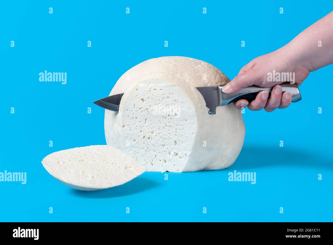 Woman big block of cheese hi-res stock photography and images - Alamy