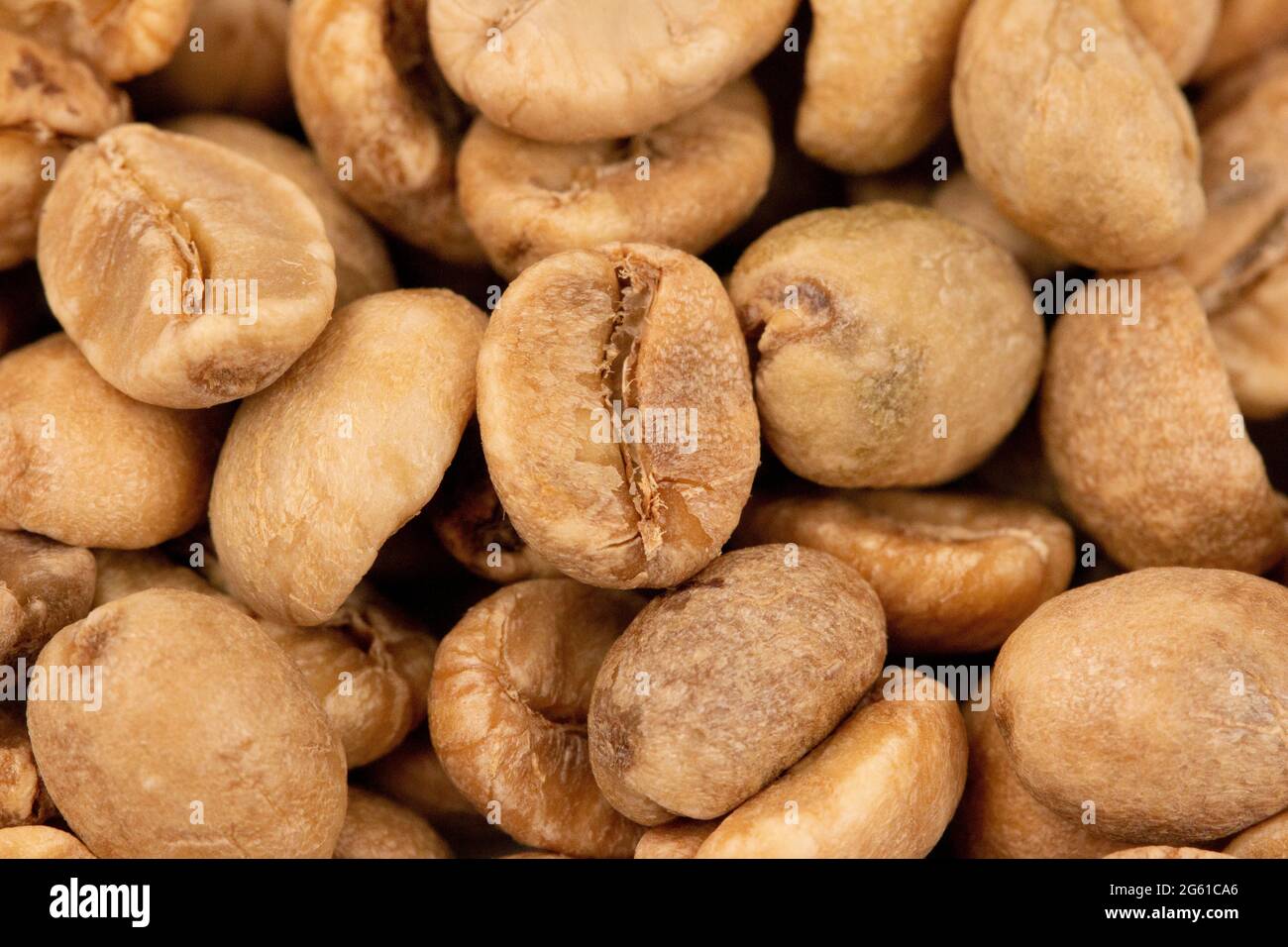 A Background of Raw Green Coffee Beans Stock Photo - Alamy