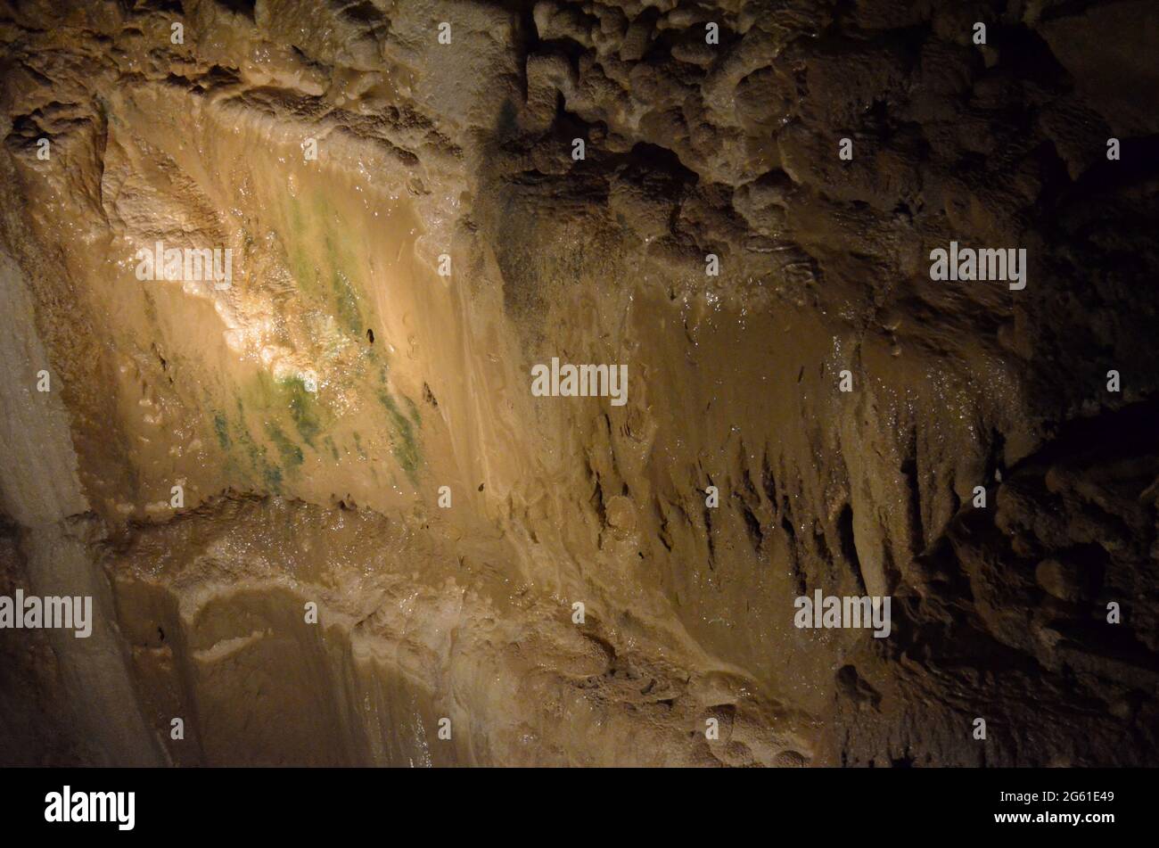 Damp walls along the waves of a cave in Ireland Stock Photo - Alamy