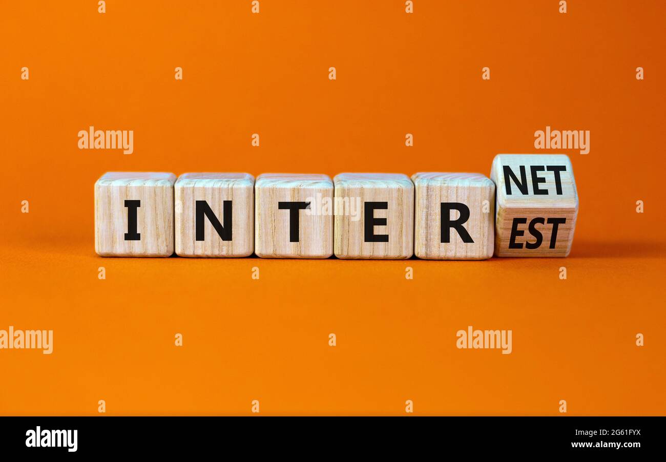 Internet and interest symbol. Turned the wooden cube and changed the ...