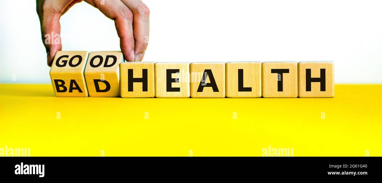 Good or bad health symbol. Doctor turns wooden cubes and changes words ...