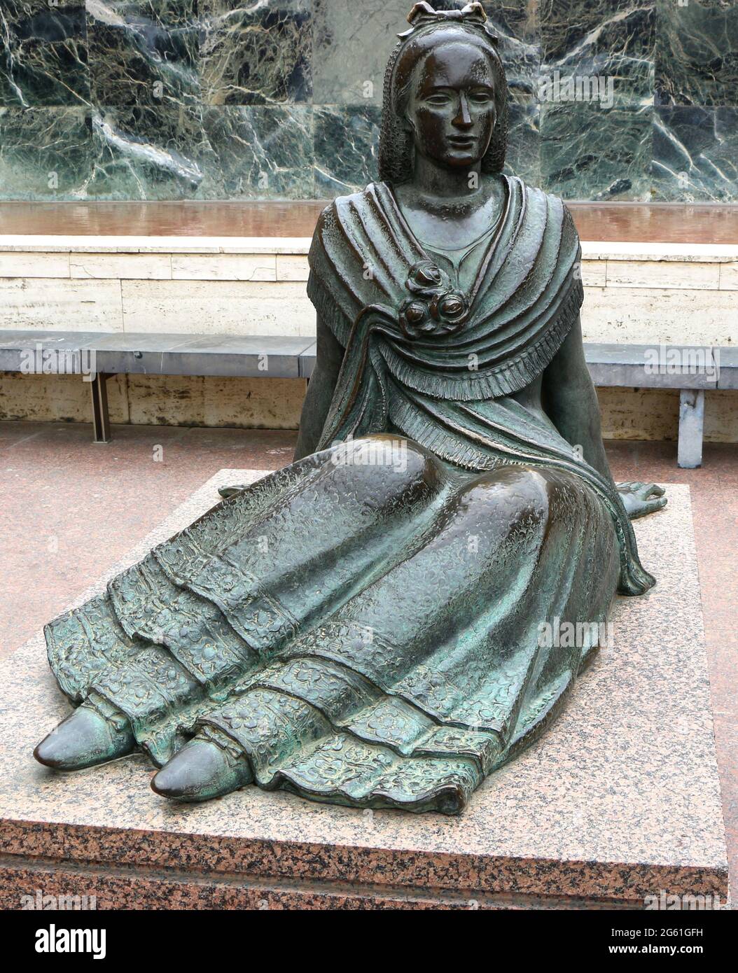 Bronze seated woman sculpture part of the Goya monument near the ...