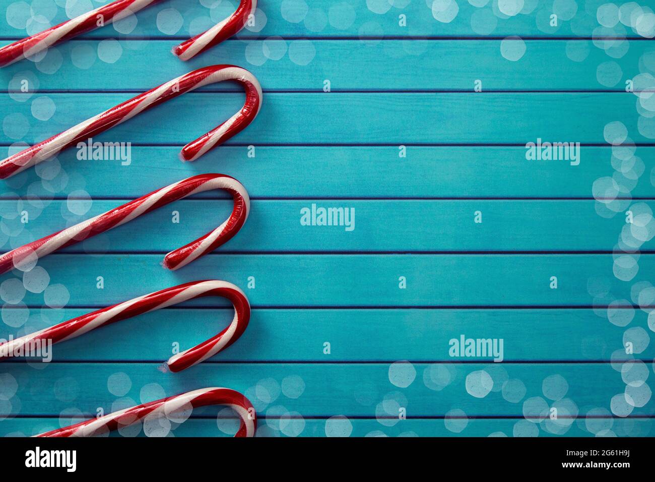 A Christmas Candy Cane Background with Traditional Colored Candy Canes ...